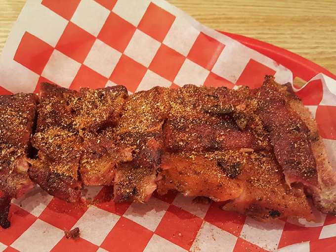Ribs with a spice rub that means business. The kind of serious flavor that makes conversation stop and eyes close involuntarily.