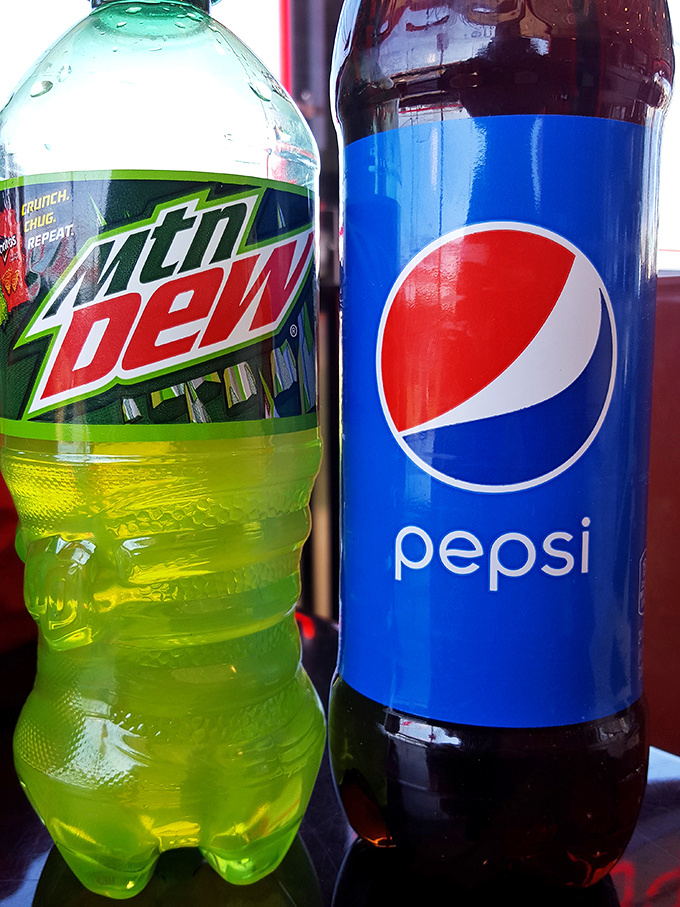 The classic beverage duo&mdash;Mountain Dew's electric green alongside Pepsi's deep brown, ready to wash down whatever deliciousness you've ordered.