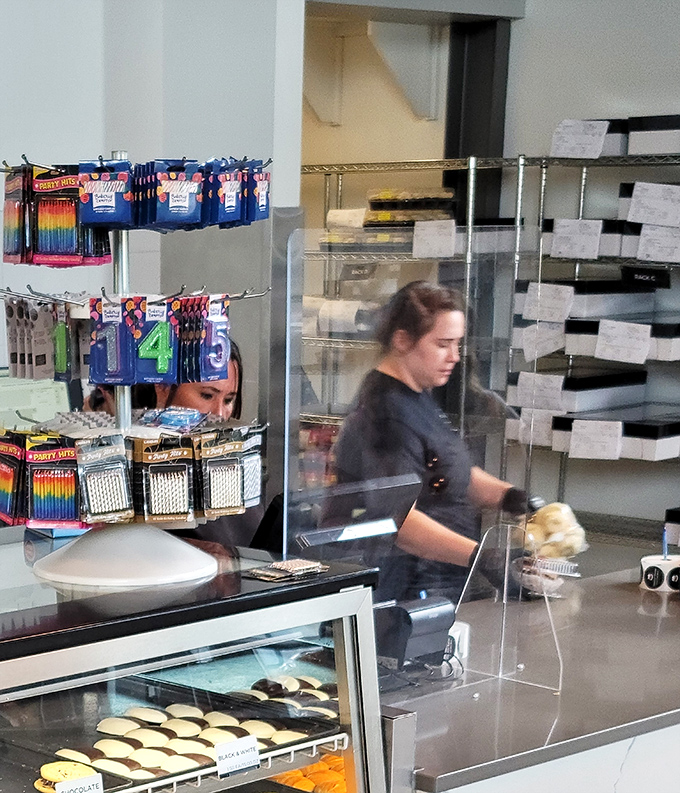 Behind the scenes, the magic happens with practiced hands and focused attention. Great bakeries are built on these quiet moments of creation.