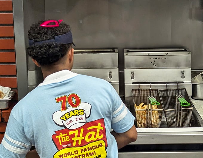 The staff moves with the precision of a championship pit crew. When you've been serving perfection for decades, efficiency becomes an art form.