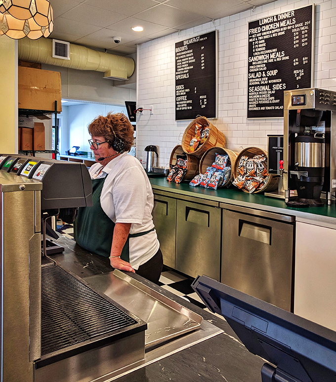 Behind every great chicken joint is a dedicated team. The careful attention at the counter is where the magic begins before that first heavenly bite.