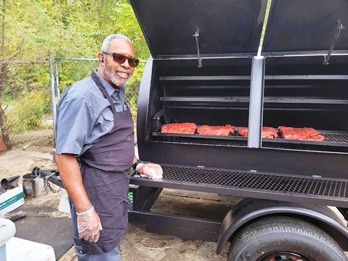 Behind every great barbecue joint is someone who understands that perfect meat requires perfect timing&mdash;and a smile that says "I know what I'm doing."