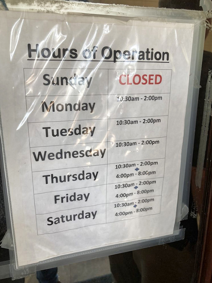 The hours of operation sign&mdash;or as locals call it, "times when it's acceptable to show up hungry and leave happy."