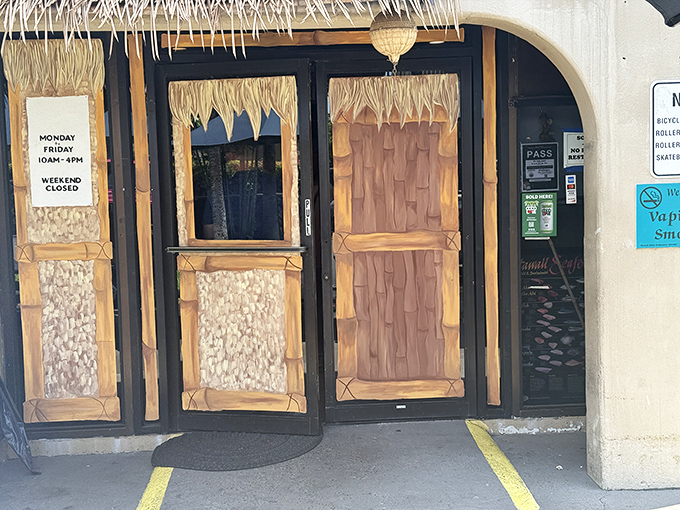 The entrance tells you everything you need to know: simple, authentic, and dressed in island style with those classic thatched details.