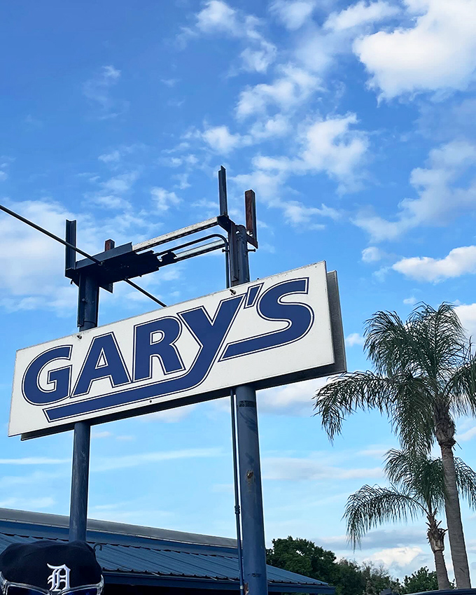 The iconic Gary's sign against a perfect Florida sky&mdash;a beacon of hope for hungry travelers seeking authentic seafood.