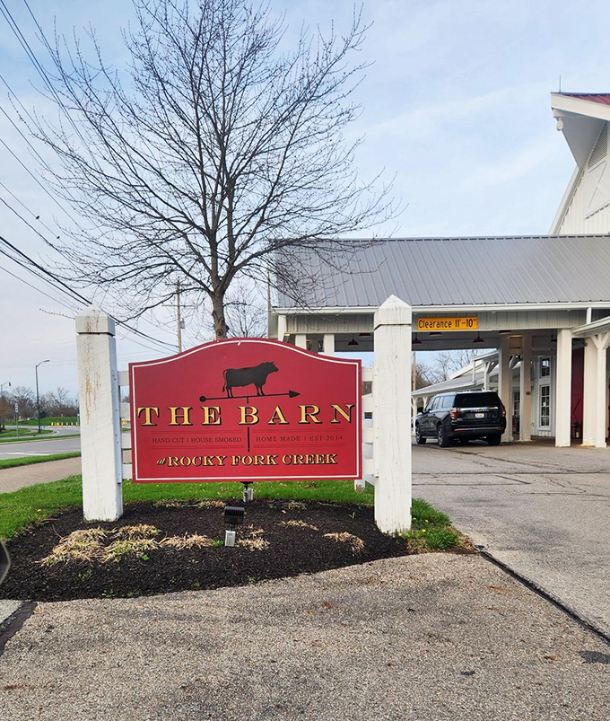 The sign says it all: simple, straightforward, with a cow silhouette that seems to wink and say, "Trust me, you're in for something special."