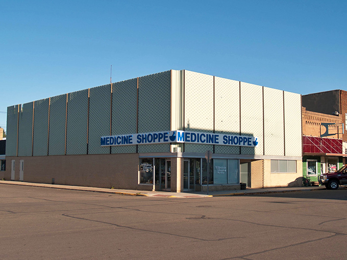 The Medicine Shoppe's distinctive mid-century facade reminds us of an era when pharmacists knew your name and probably your grandmother's too.