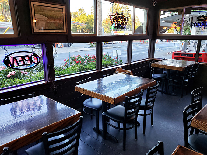 Large windows flood the dining area with natural light, creating the perfect stage for the meat-centric drama about to unfold on your plate.