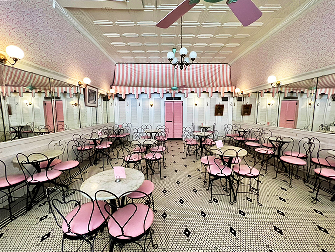Pink chairs invite you to linger in a room where calories don't count. The black and white tile floor has witnessed countless first dates and family celebrations.