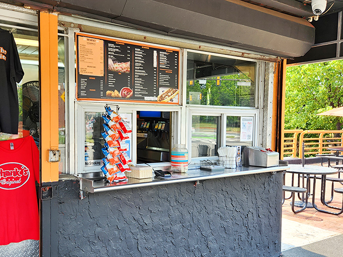 The take-out window: where dreams come true and diets go to die. Simple, efficient, and gloriously old-school.
