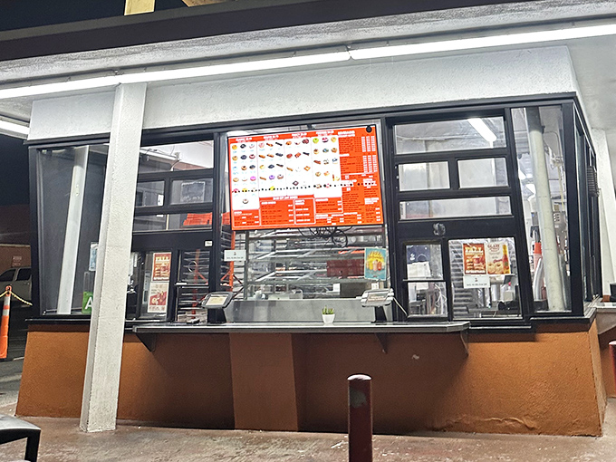 The walk-up window experience&mdash;fast, efficient, and straight to the point. No frills needed when the donuts speak for themselves.