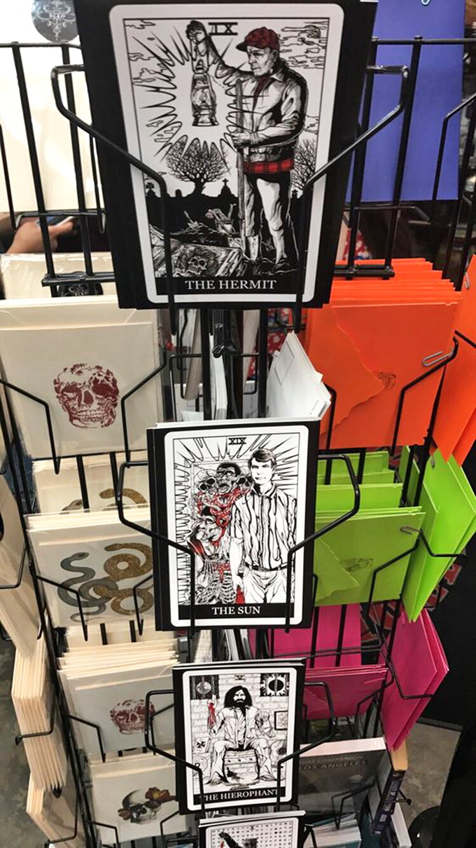 Macabre tarot cards in the gift shop offer visitors a chance to take home a stylized memento of mortality.