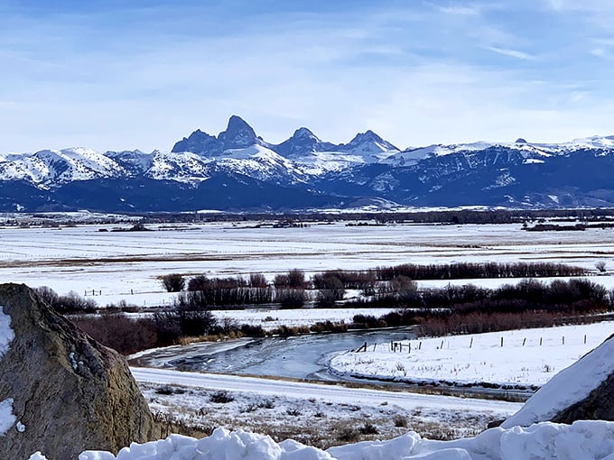 Winter transforms the byway into a snow globe come to life, with mountains frosted like nature's wedding cake.