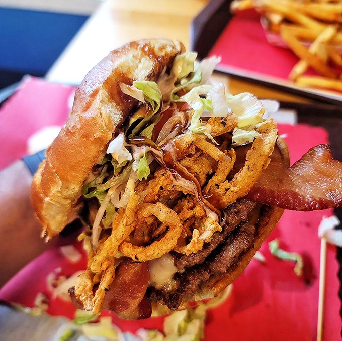 This isn't just a burger&mdash;it's a towering monument to excess done right. Every layer tells a different delicious story.