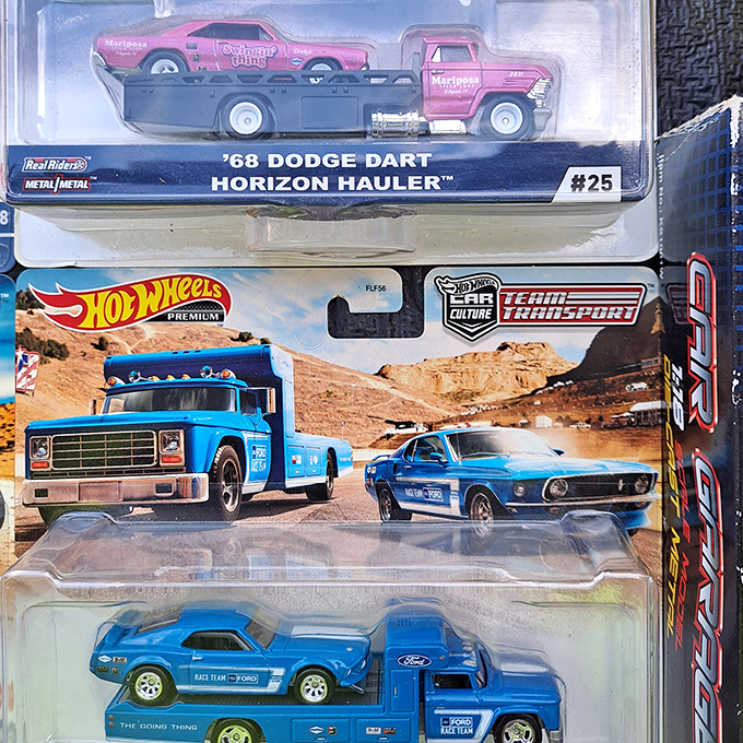 Miniature automotive dreams in pristine packaging. That blue Ford Mustang hauler combo would make any grown man suddenly remember being eight years old.