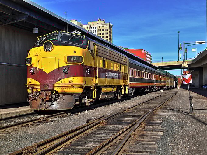 The bold yellow and red of this diesel locomotive pops against Duluth's urban backdrop &ndash; a rolling reminder of America's railroad heritage.