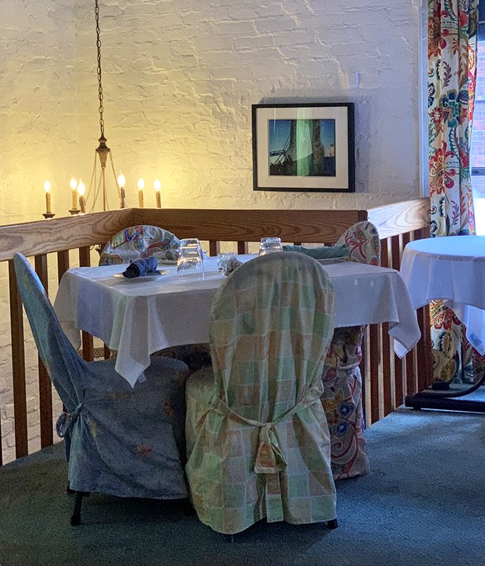 Another cozy corner where chandelier light makes everyone look ten years younger – no Instagram filter needed.