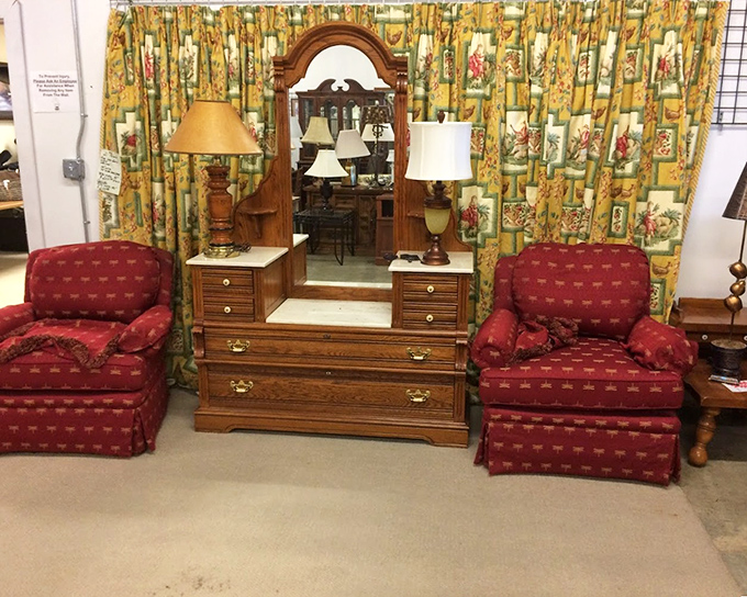 This vanity setup with matching burgundy chairs isn't just furniture&mdash;it's a time machine to when getting ready was an event, not a rushed morning ritual.