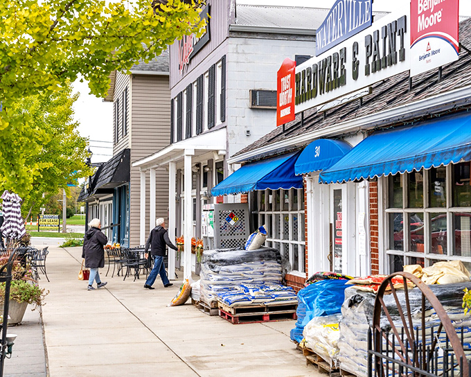 Hardware stores and local shops line the sidewalks, where shopping isn't just a transaction but a chance to catch up on community news.