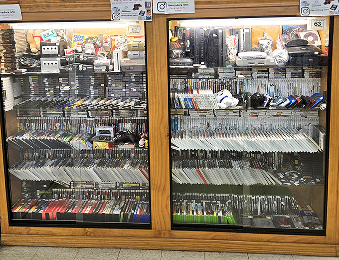 Video game history preserved behind glass. For many visitors, this case triggers both nostalgia and the sudden urge to call their parents about attic boxes.