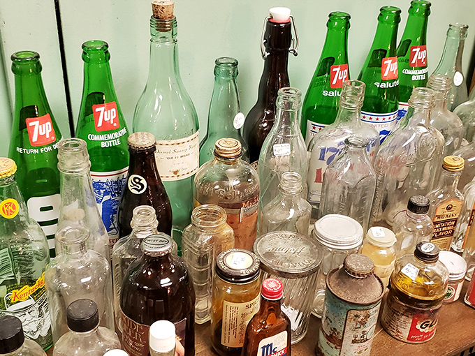 Old 7UP bottles and mystery jars create a glass menagerie that tells the story of American beverages through the decades.