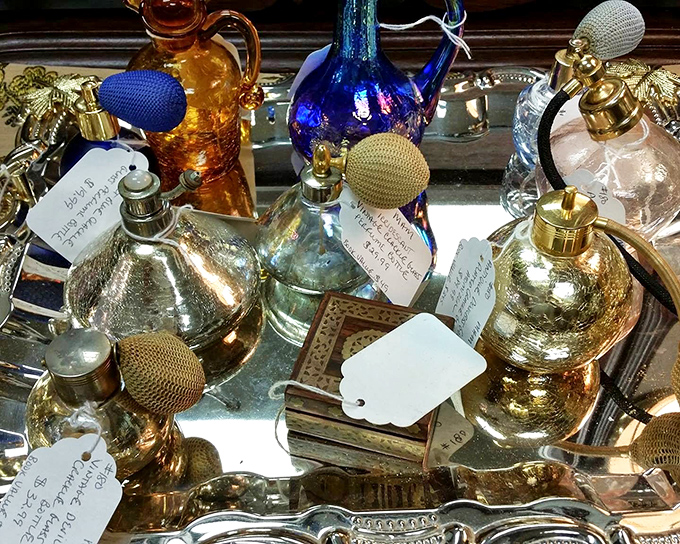 A collection of perfume atomizers that once graced the vanities of women who wrote letters, not texts, and always answered the phone.