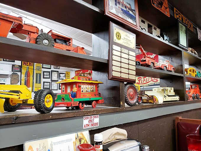 Vintage toy trucks and tractors line the shelves like a roadside museum you can actually eat in.