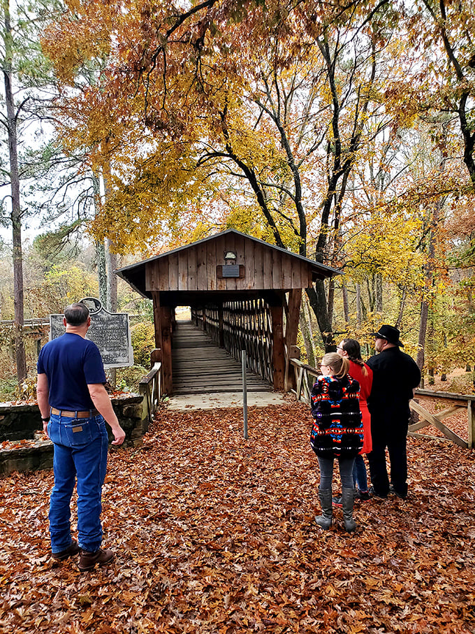 Fall's golden carpet welcomes visitors to this historical passage. The only admission price? Taking a moment to appreciate craftsmanship from a bygone era.