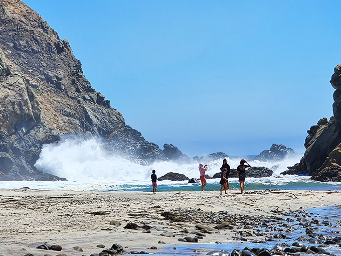 The beach becomes nature's playground where visitors find perspective among towering cliffs. Suddenly, inbox zero doesn't seem so important.