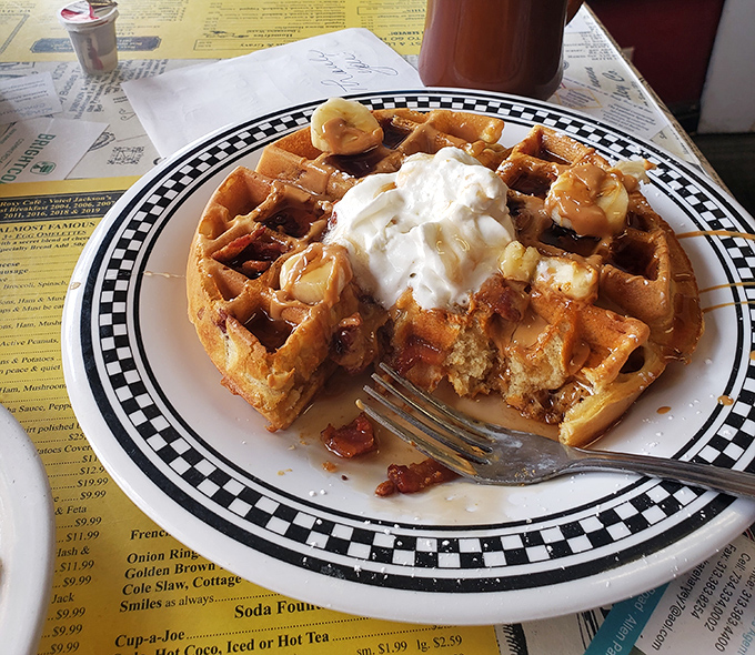 This waffle doesn't just come with toppings&mdash;it comes with a philosophy: life is short, eat the whipped cream first.