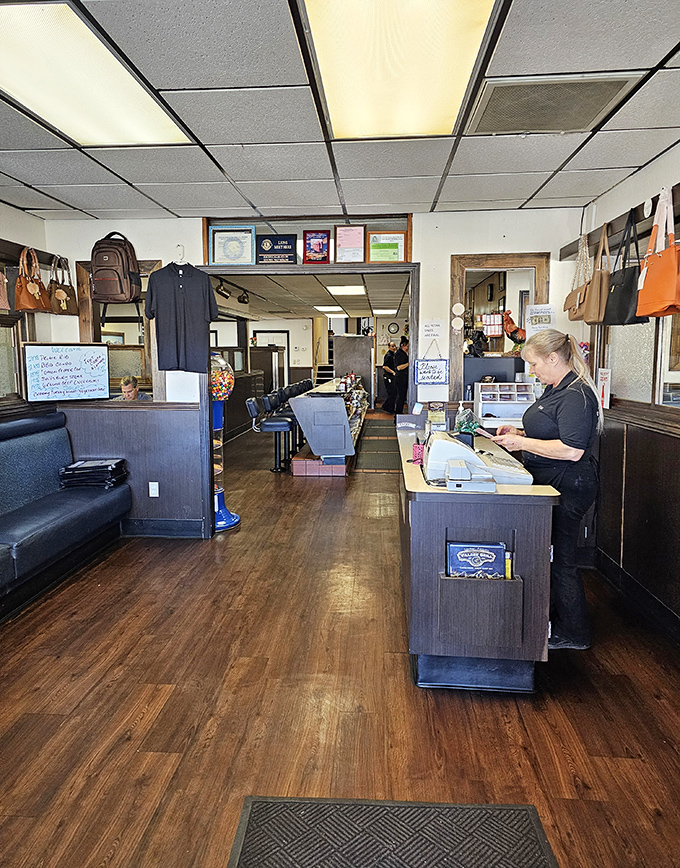 Where the magic happens—the counter area where orders are called, coffee is poured, and regulars exchange daily news with staff.