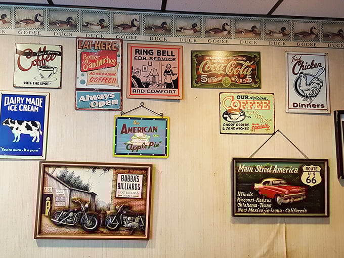 Walls decorated with enough memorabilia to make the Smithsonian consider a burger history wing.