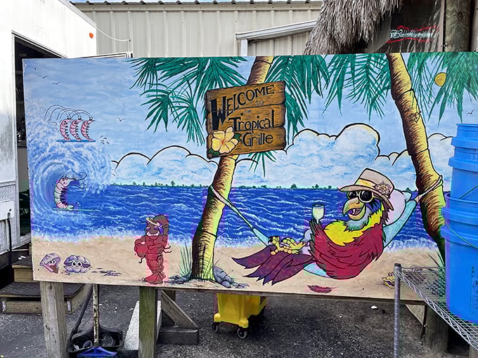 The welcome sign that promises vacation vibes, even on a Tuesday. That parrot knows what you're in for&mdash;a good time with good food.