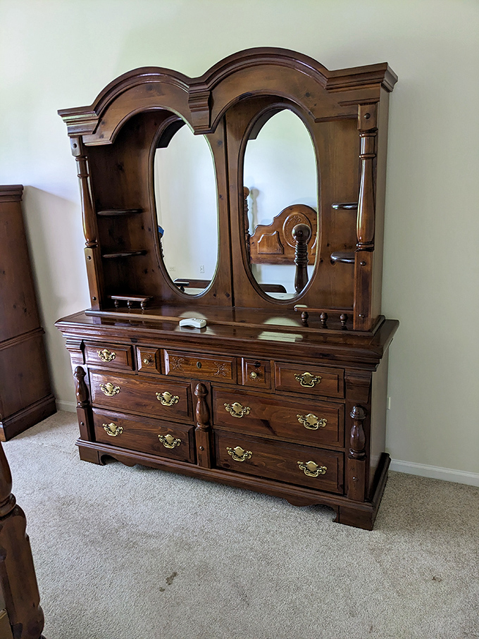 This wooden dresser with mirror isn't just furniture&mdash;it's a time machine to when craftsmanship meant something and drawers actually stayed on track. 