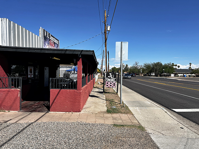 Red barn vibes meet serious BBQ business - this is where authentic flavors call home.