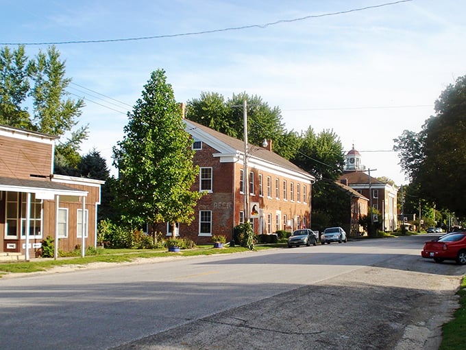 Red brick memories under endless blue! Bishop Hill's historic street scene serves up a slice of preserved Americana with a side of Swedish heritage.
