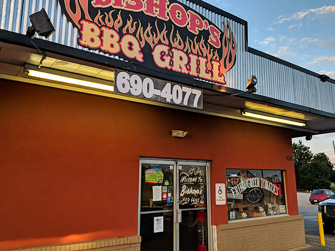 Bishop's BBQ Grill's bright signage cuts through the Mississippi sky like a beacon for barbecue lovers.
