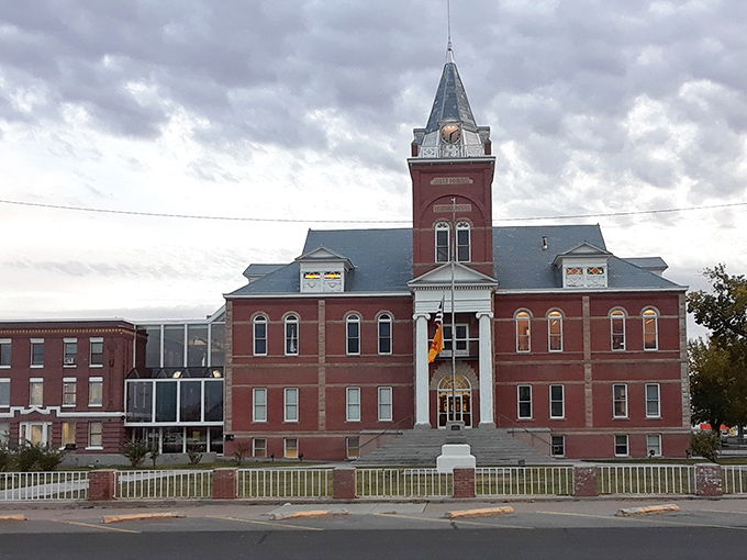 Deming's stately building stands as the crown jewel of downtown, its red brick grandeur a symbol of small-town pride.