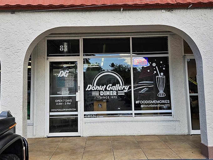 Donut Gallery's unassuming entrance hides decades of breakfast magic. That arched doorway is a portal to comfort food paradise!