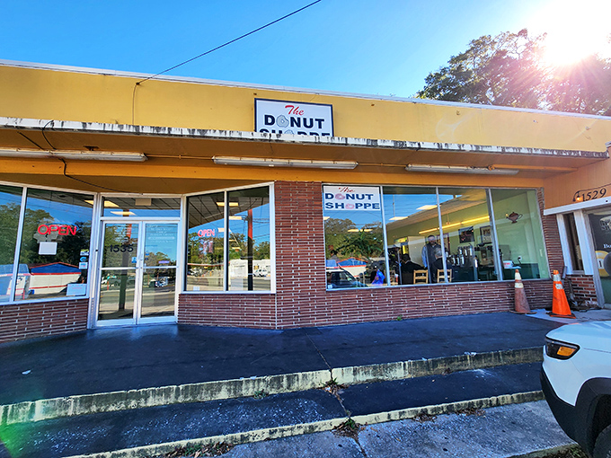The Donut Shoppe's vintage yellow storefront is a time machine to when donuts were simple, perfect, and worth lining up for.