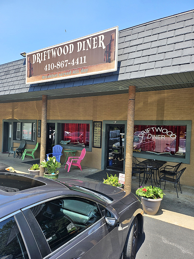 Driftwood Diner's colorful outdoor chairs add a playful touch to this cozy neighborhood spot.