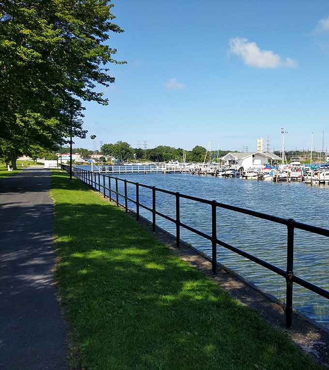 Dunkirk's waterfront path invites leisurely strolls along the harbor, where boats bob and housing costs stay surprisingly grounded.