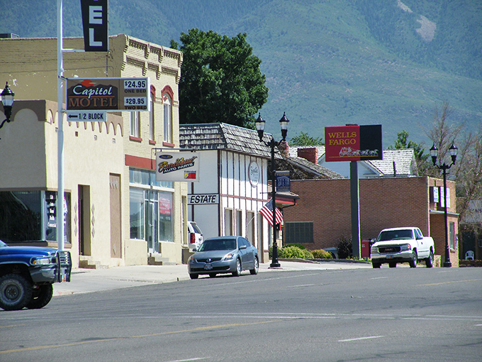 The mountains stand guard over Fillmore's Main Street, where prices haven't climbed nearly as high as the peaks.