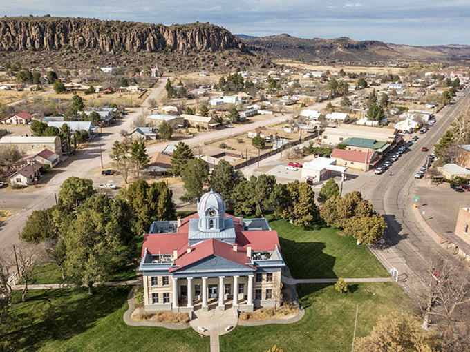 Fort Davis sits nestled against dramatic mountains, where the courthouse stands as a testament to frontier justice and solid stonework.