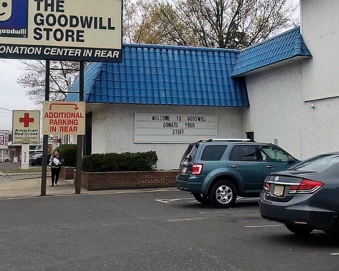 That classic blue roof signals quality thrifting ahead, where community support meets incredible bargain hunting opportunities.