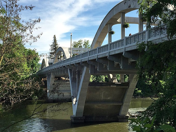 This graceful bridge arches over calm waters, connecting retirees to affordable living without burning bridges with their bank accounts.