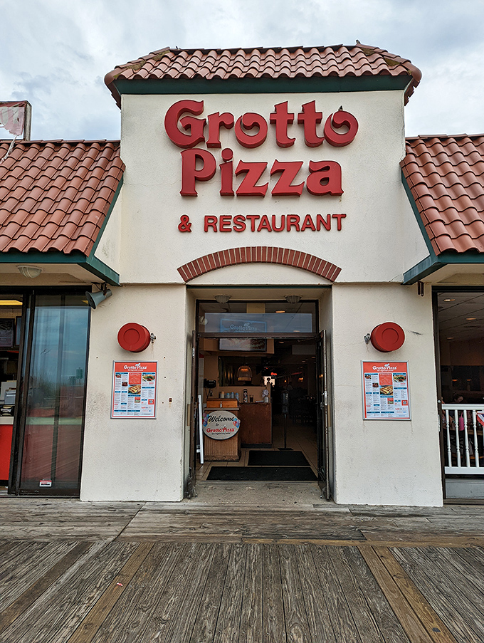 That classic red tile roof isn't just for show - it's your beacon to boardwalk pizza paradise.