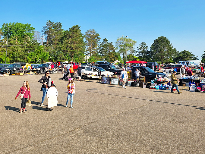 Families stroll through vendor rows like it's the neighborhood block party, except everyone's selling their coolest stuff today.