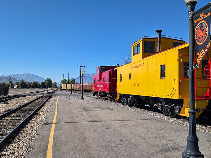 That bright yellow caboose isn't just decoration – it's a reminder that Heber City's railroad heritage still runs through town today.