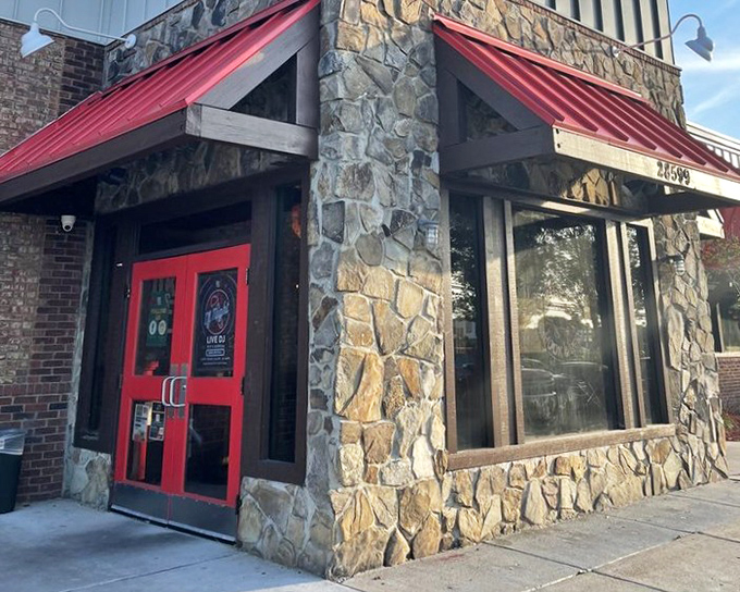 Hook & Reel's stone and brick exterior with those red metal awnings hints at the spicy treasures inside.